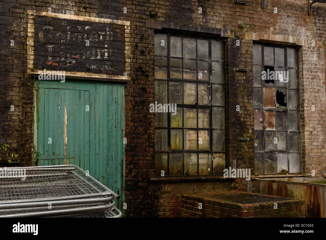 A derelict factory abandoned building in a state of decay with broken ...