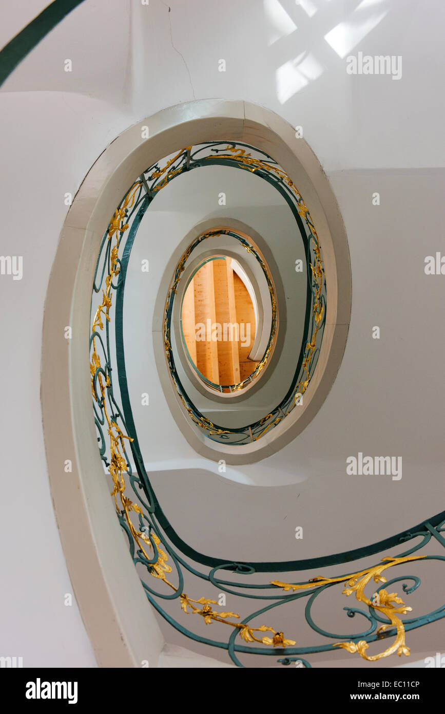 Looking up a restored elliptical staircase in a building in Berlin's ...