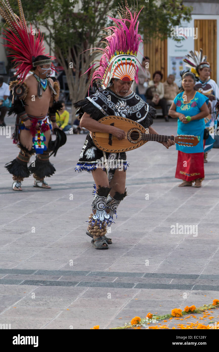 Concheros dancers performing a traditional dance and ceremony on dia de ...