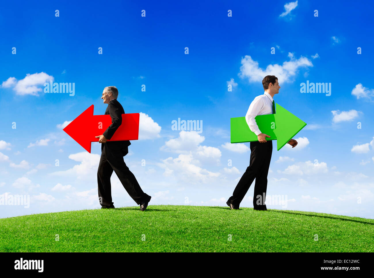 Two Businessmen Holding Contrasting Arrows Making Seperate Ways Stock ...