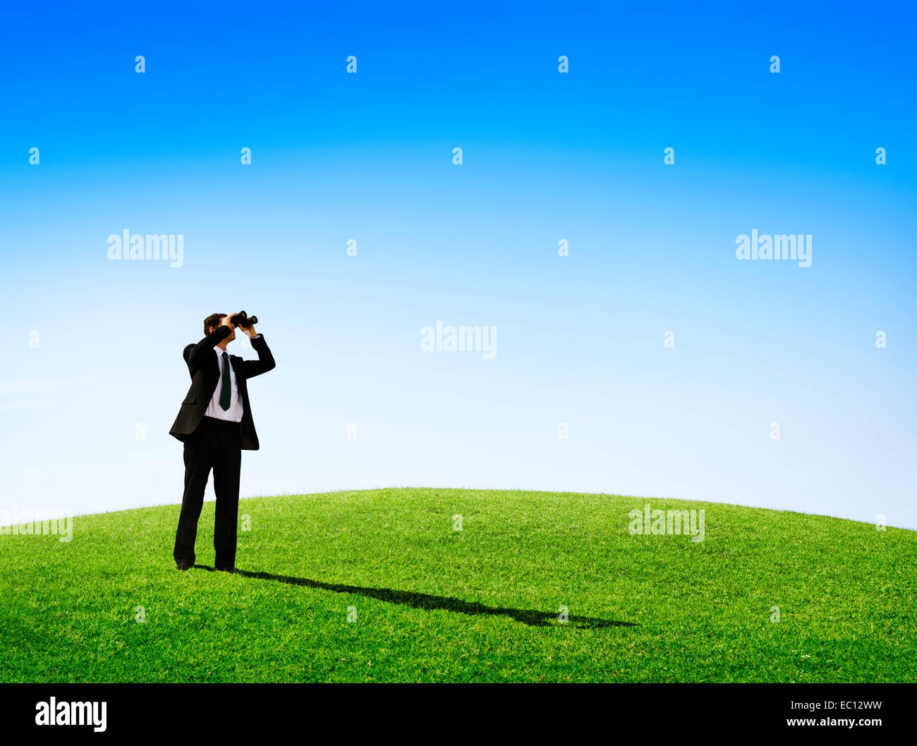 Business man observing nature with a telescope outdoors Stock Photo - Alamy
