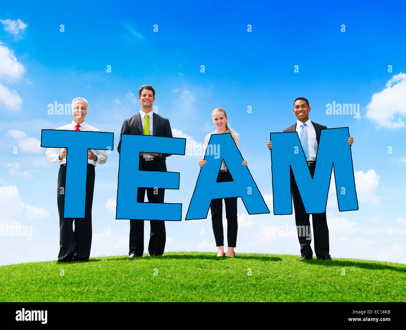 Business People Outdoors Holding Text Team Stock Photo - Alamy