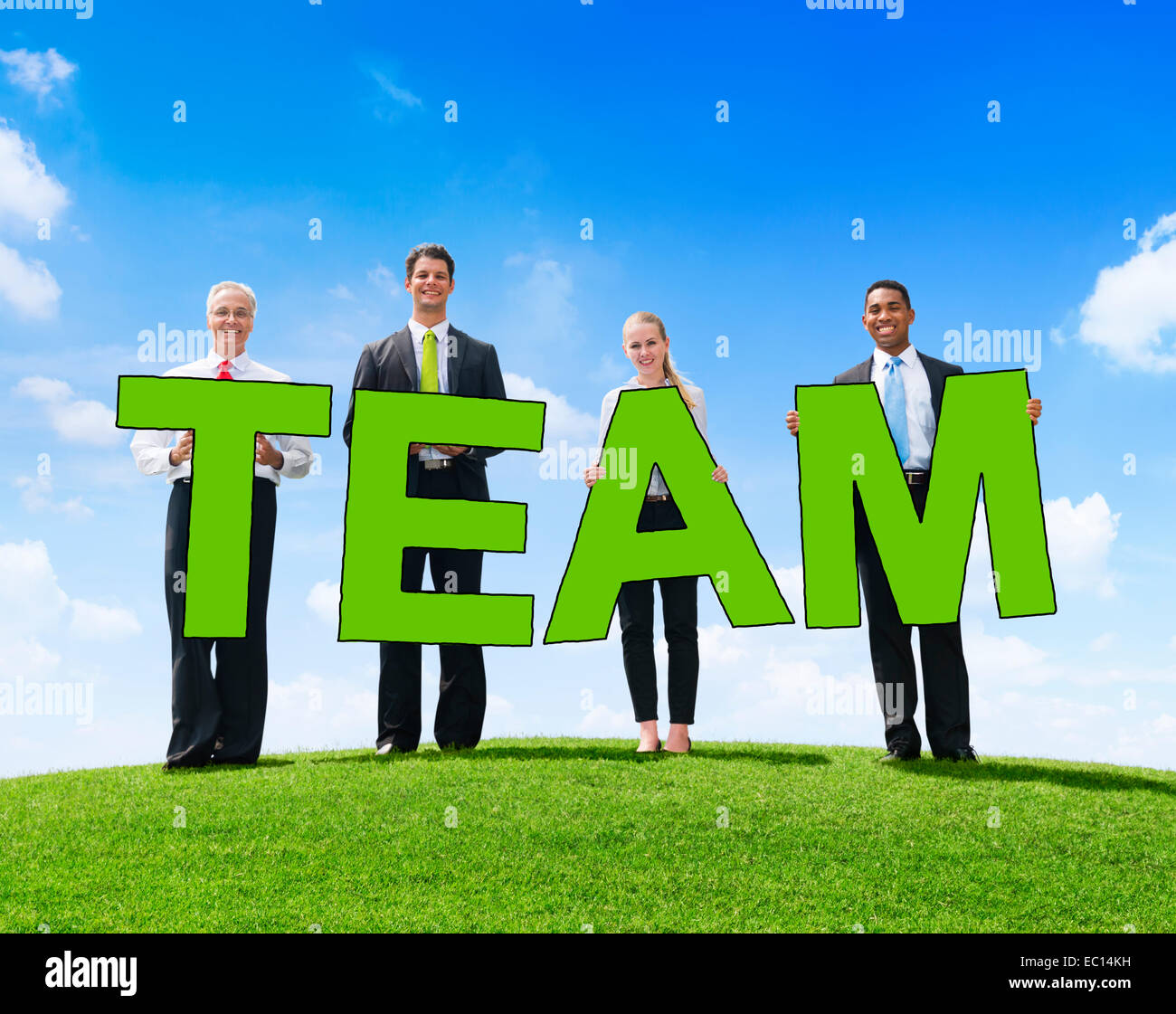Business People Outdoors Holding Text Team Stock Photo - Alamy