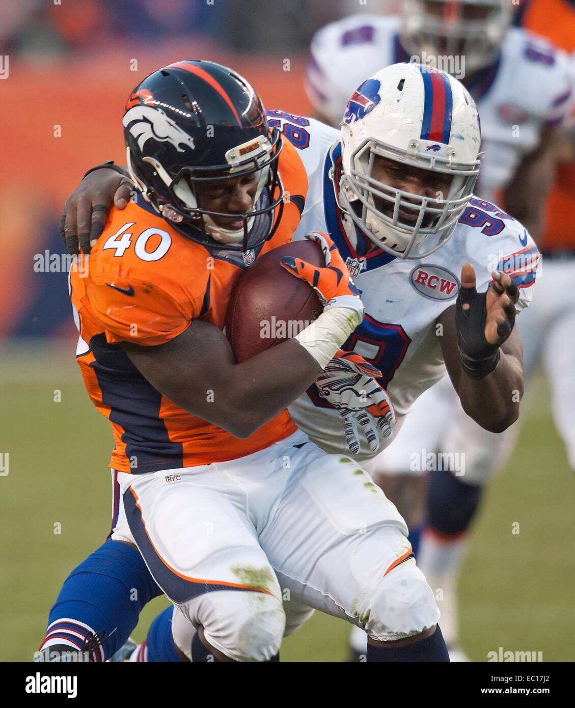 Denver, Colorado, USA. 7th Dec, 2014. Broncos RB JUWAN THOMPSON, left ...