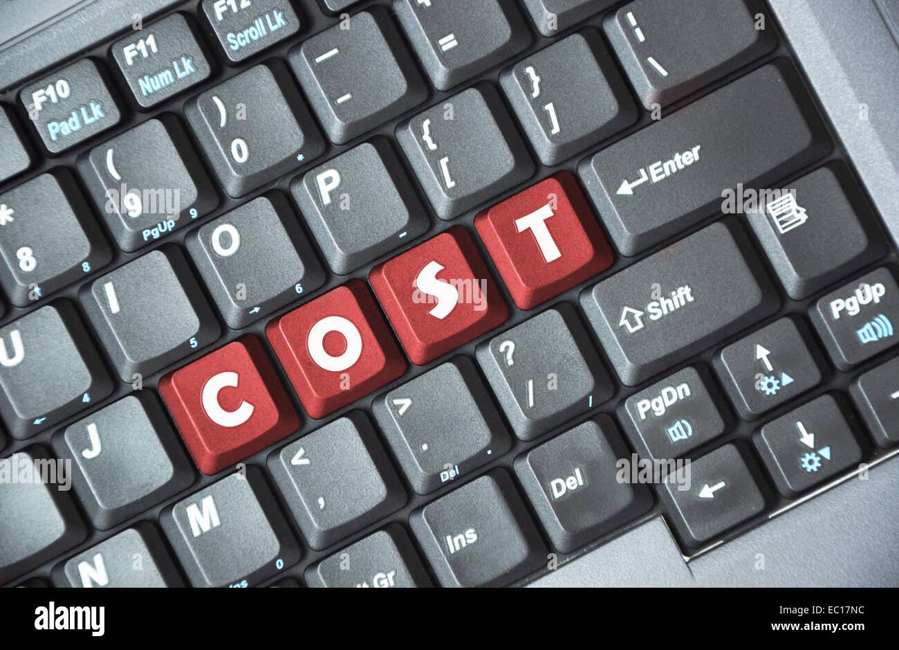 Red cost key on keyboard Stock Photo - Alamy