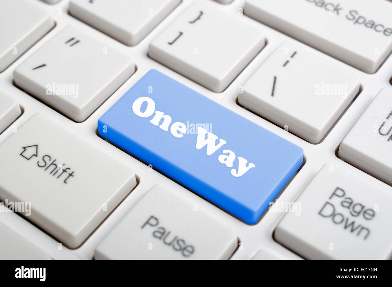 Blue one way key on keyboard Stock Photo - Alamy