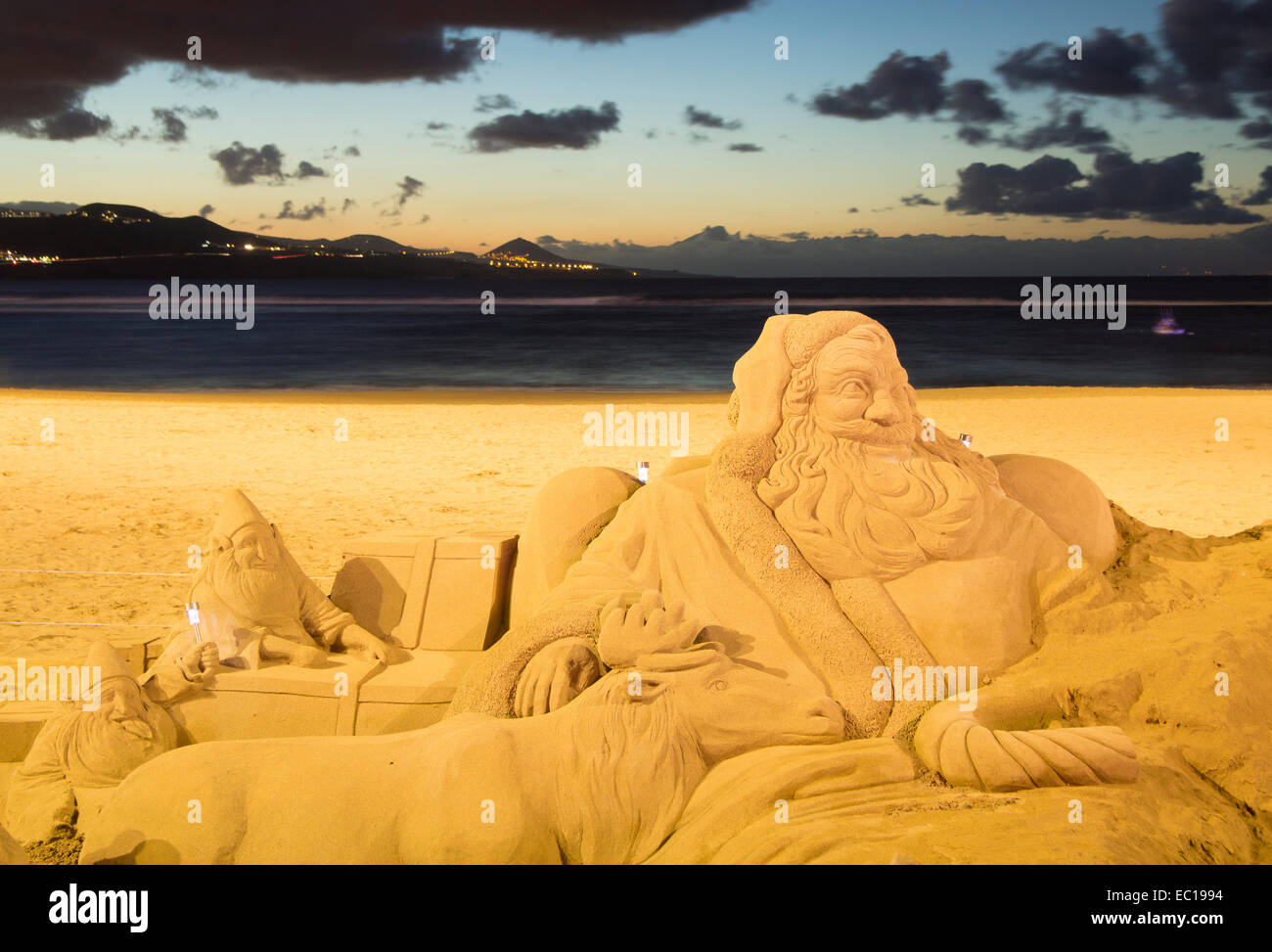 Santa Claus sand sculpture on beach in Canary Islands, Spain Stock ...
