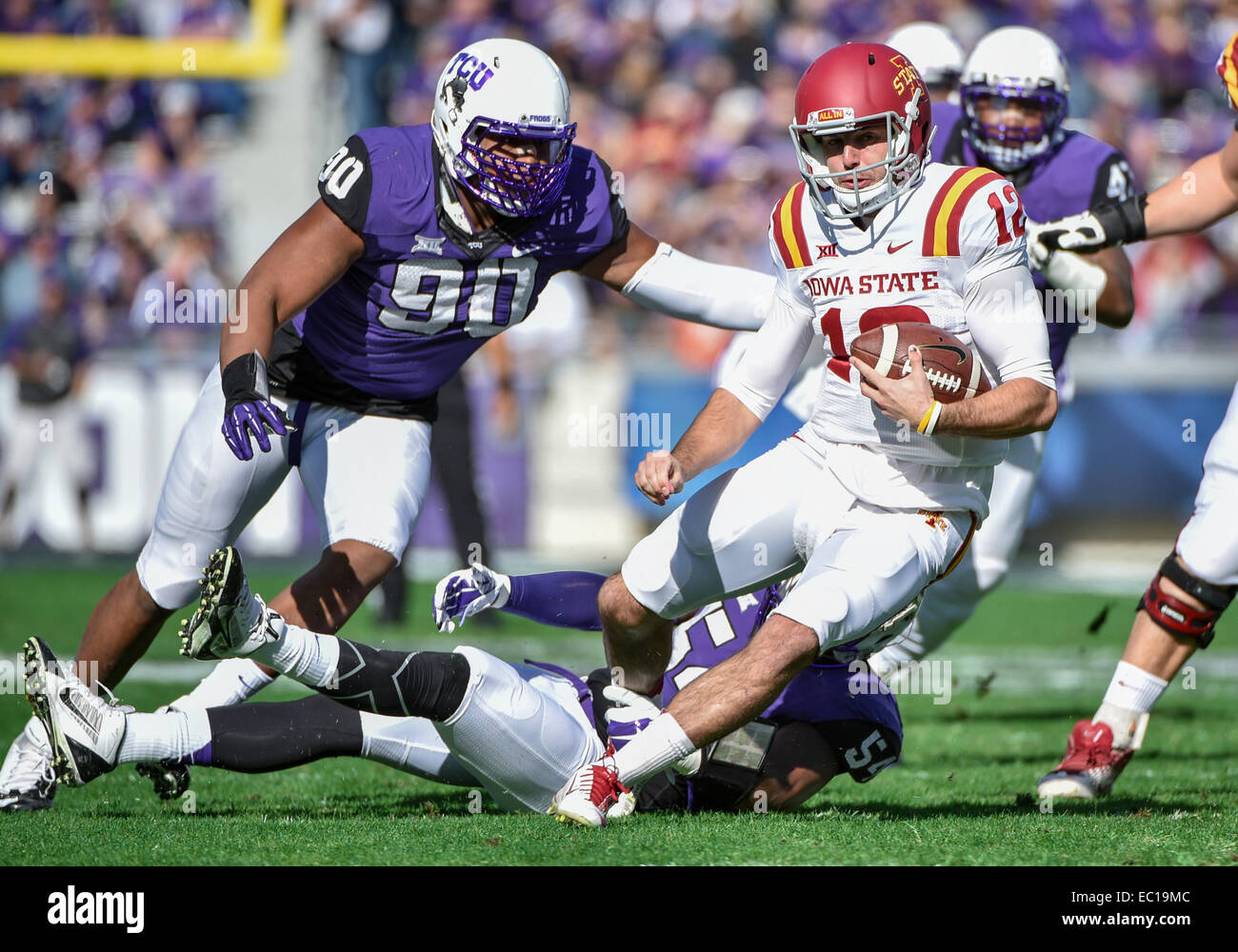Iowa State Cyclones quarterback Sam B. Richardson (12) tries to elude ...