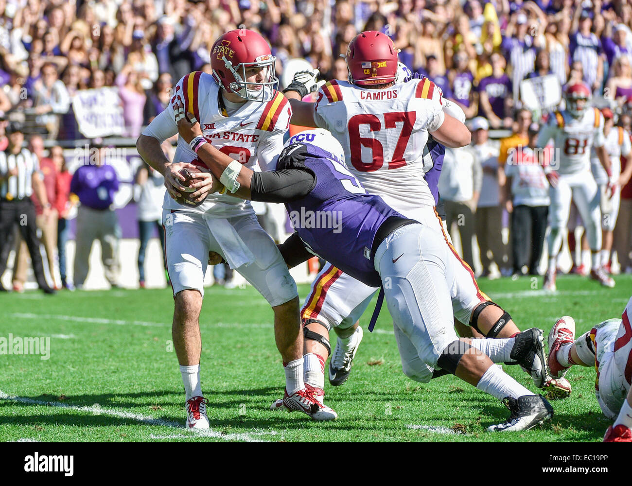 Iowa State Cyclones quarterback Sam B. Richardson (12) tries to elude a ...