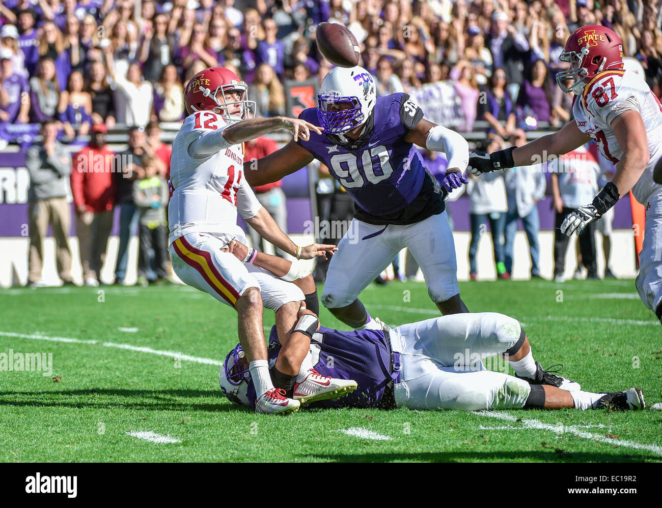 Iowa State Cyclones quarterback Sam B. Richardson (12) tries to elude a ...