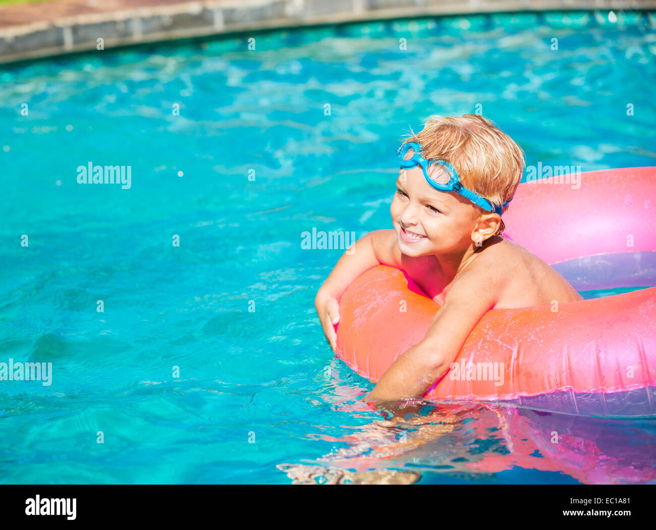 Yellow tube in pool hi-res stock photography and images - Alamy