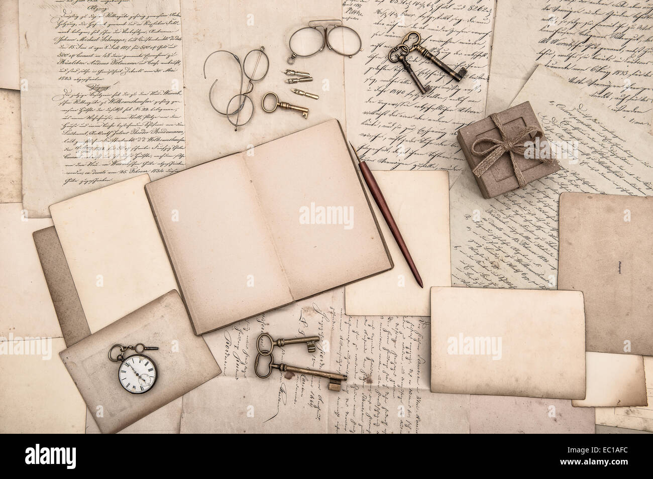 antique accessories, open book and old handwritten letters. nostalgic ...
