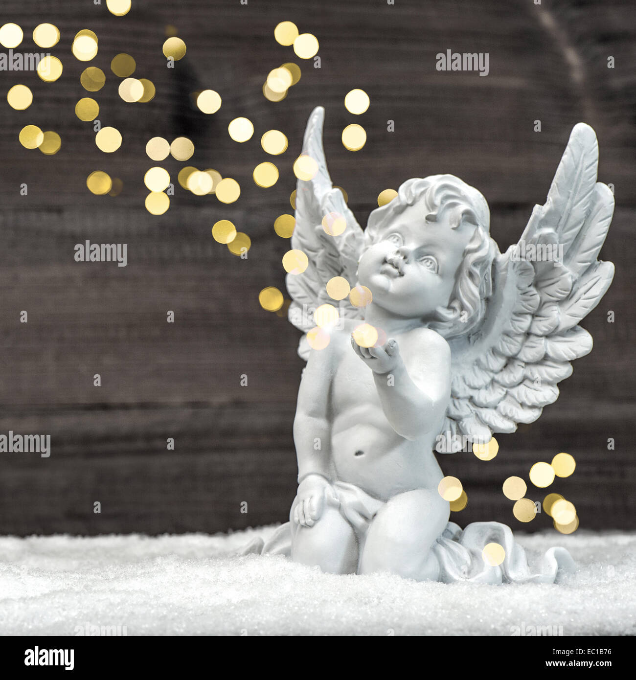 little guardian angel with shiny lights. vintage style christmas ...