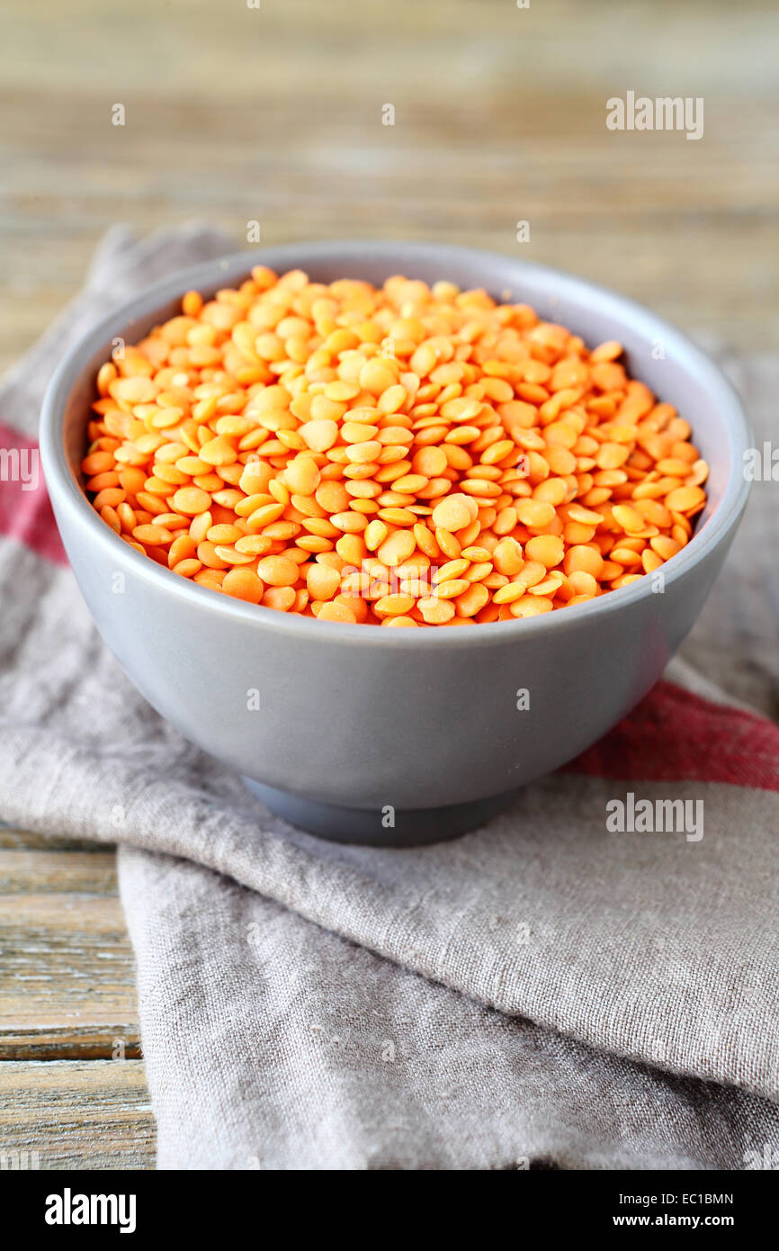 Uncooked lentils in a bowl, ingredient Stock Photo - Alamy