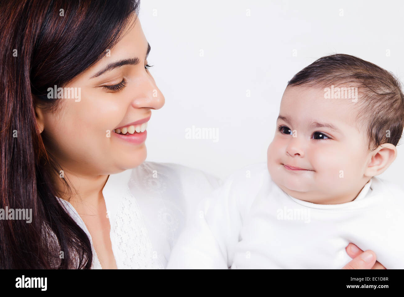 Indian babies with mums hi-res stock photography and images - Alamy