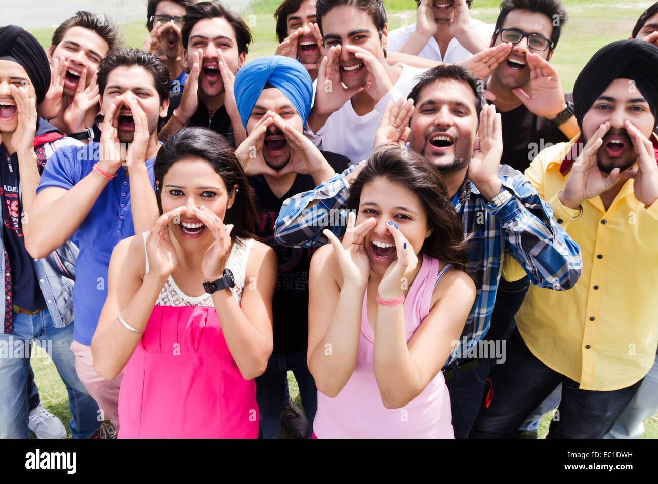 indian group crowds park calling Stock Photo - Alamy