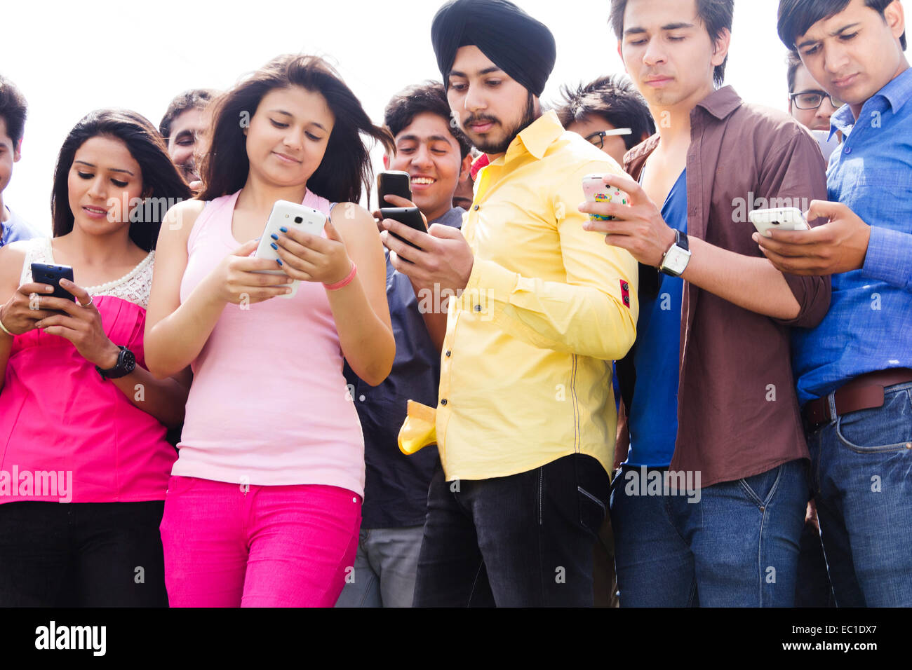 indian group crowds park with phone Stock Photo - Alamy