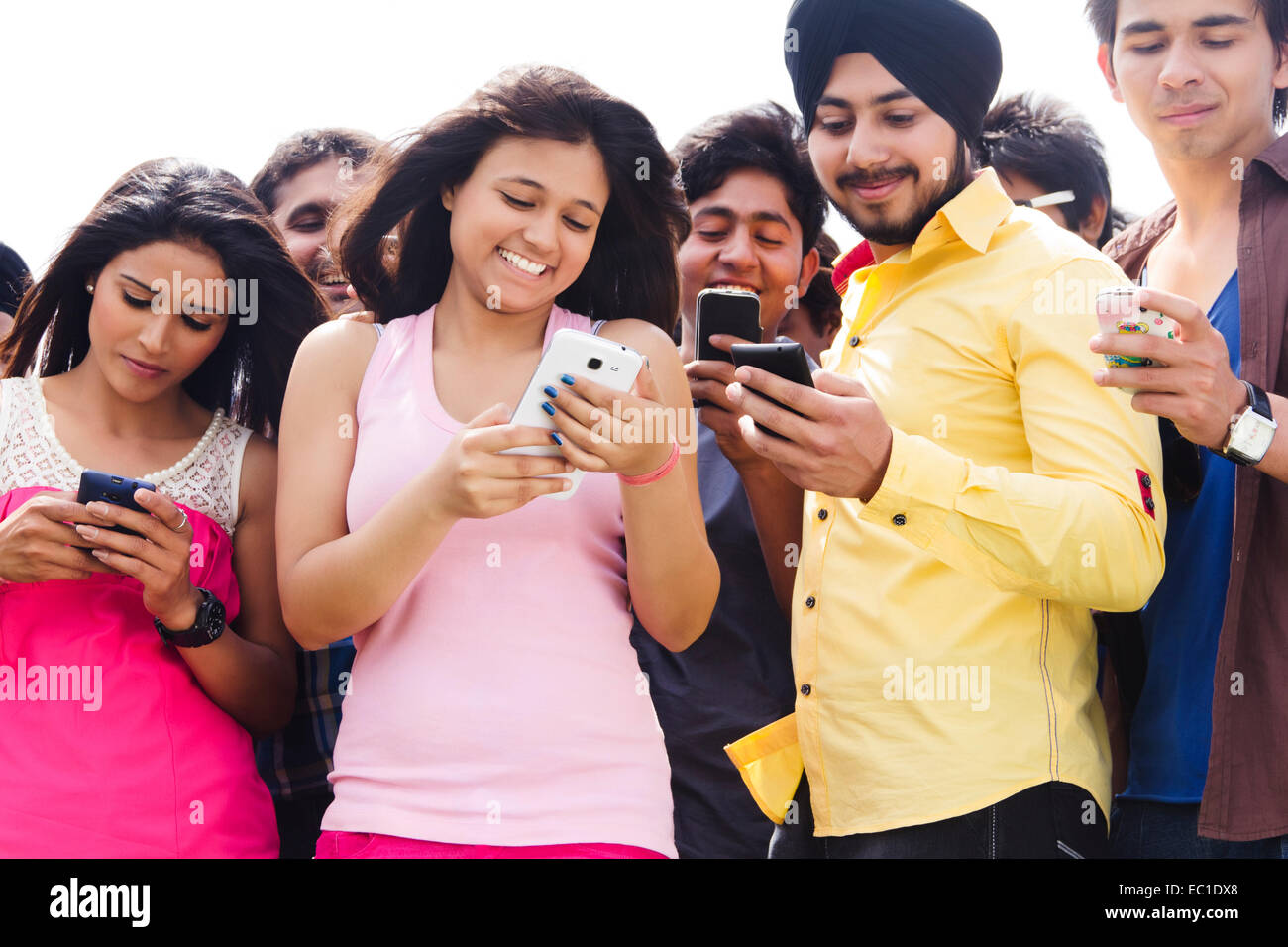 indian group crowds park with phone Stock Photo - Alamy