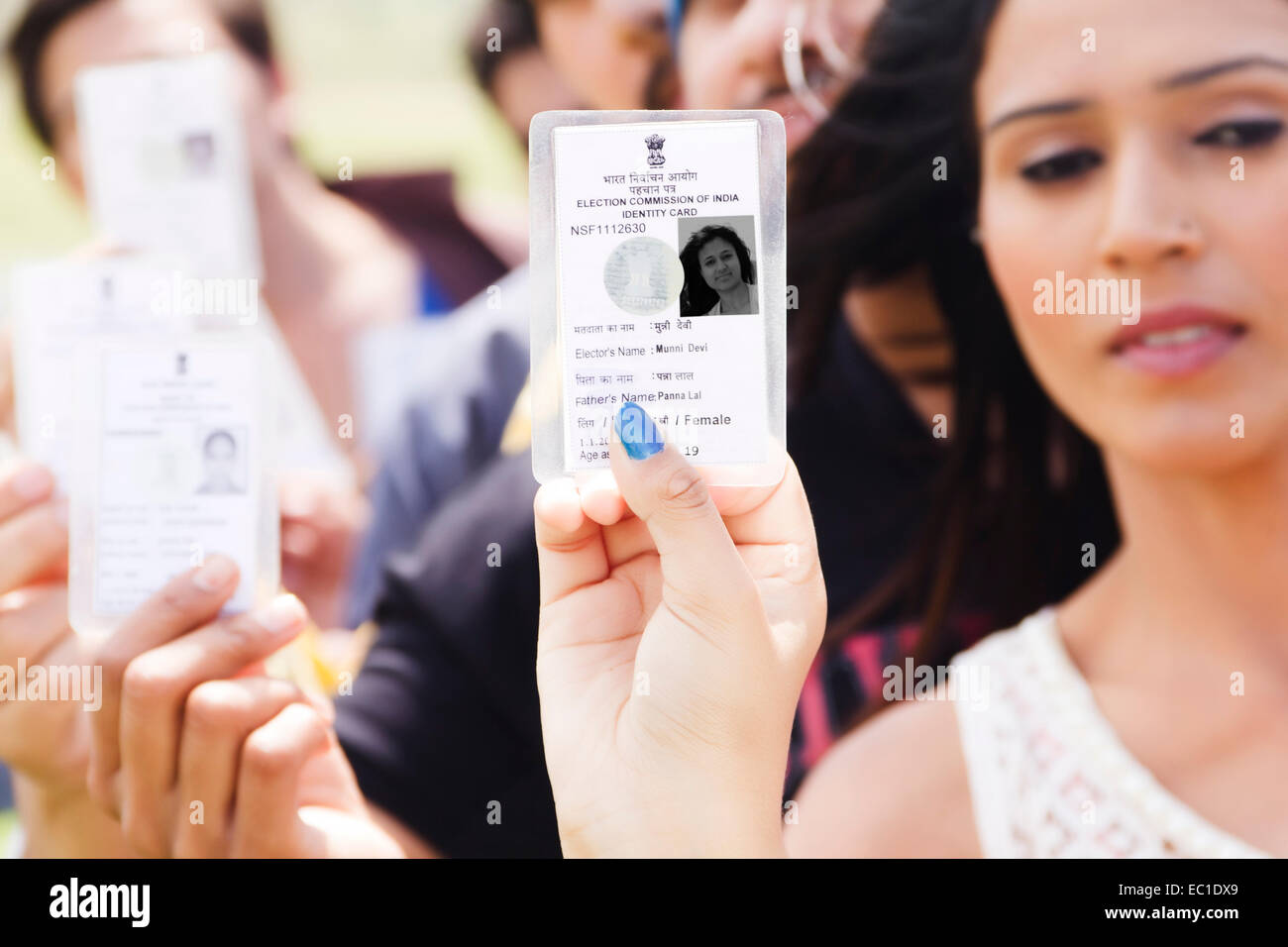 indian group crowds Election line with Voter id card Stock Photo - Alamy