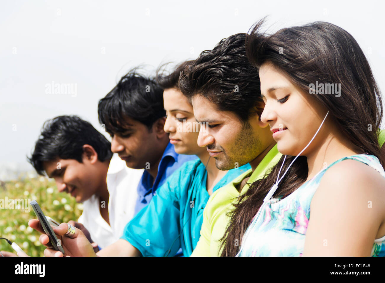 indian group friends Music phone Stock Photo - Alamy