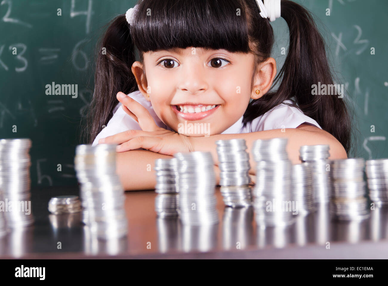 indian Beautiful child Student with Money Stock Photo - Alamy