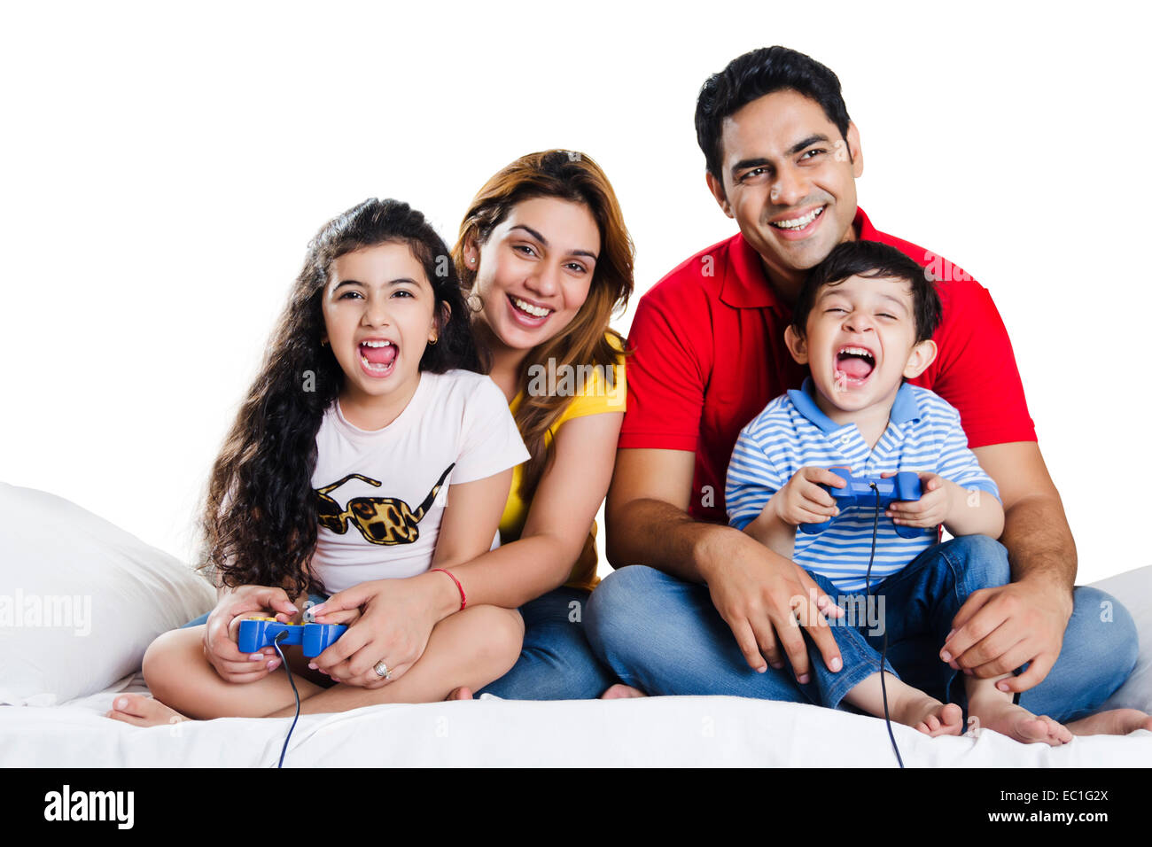 indian Parents with children playing Video Game Stock Photo - Alamy