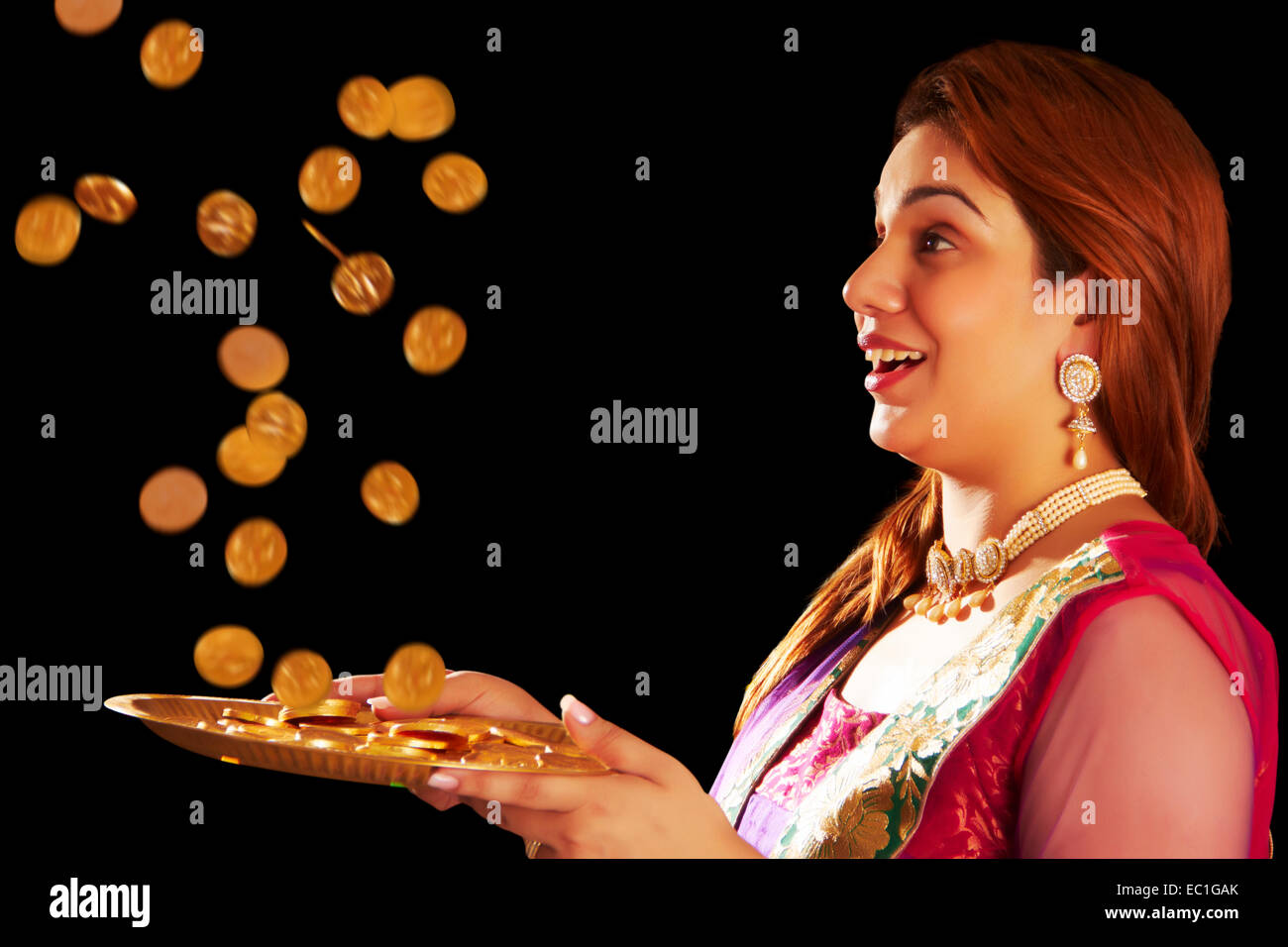 Looking at gold coins hi-res stock photography and images - Alamy
