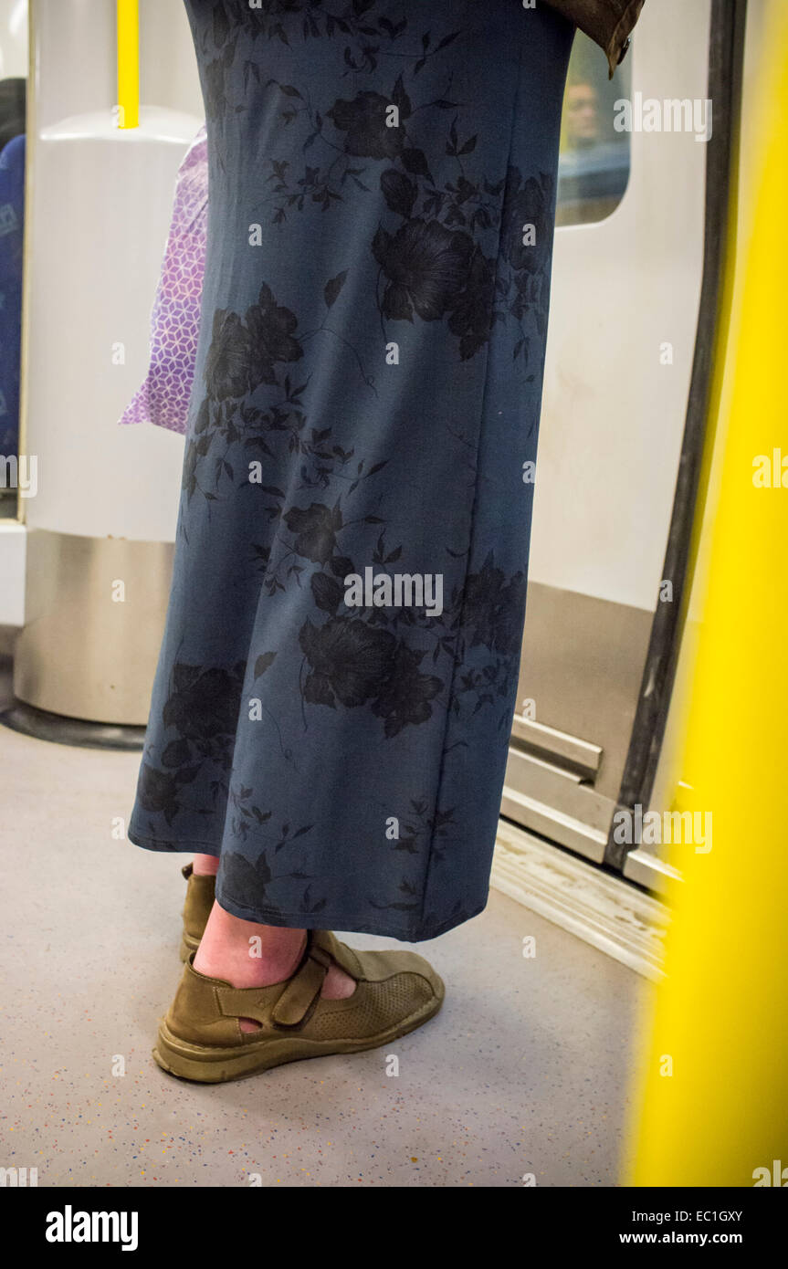 passengers legs on subway Stock Photo - Alamy