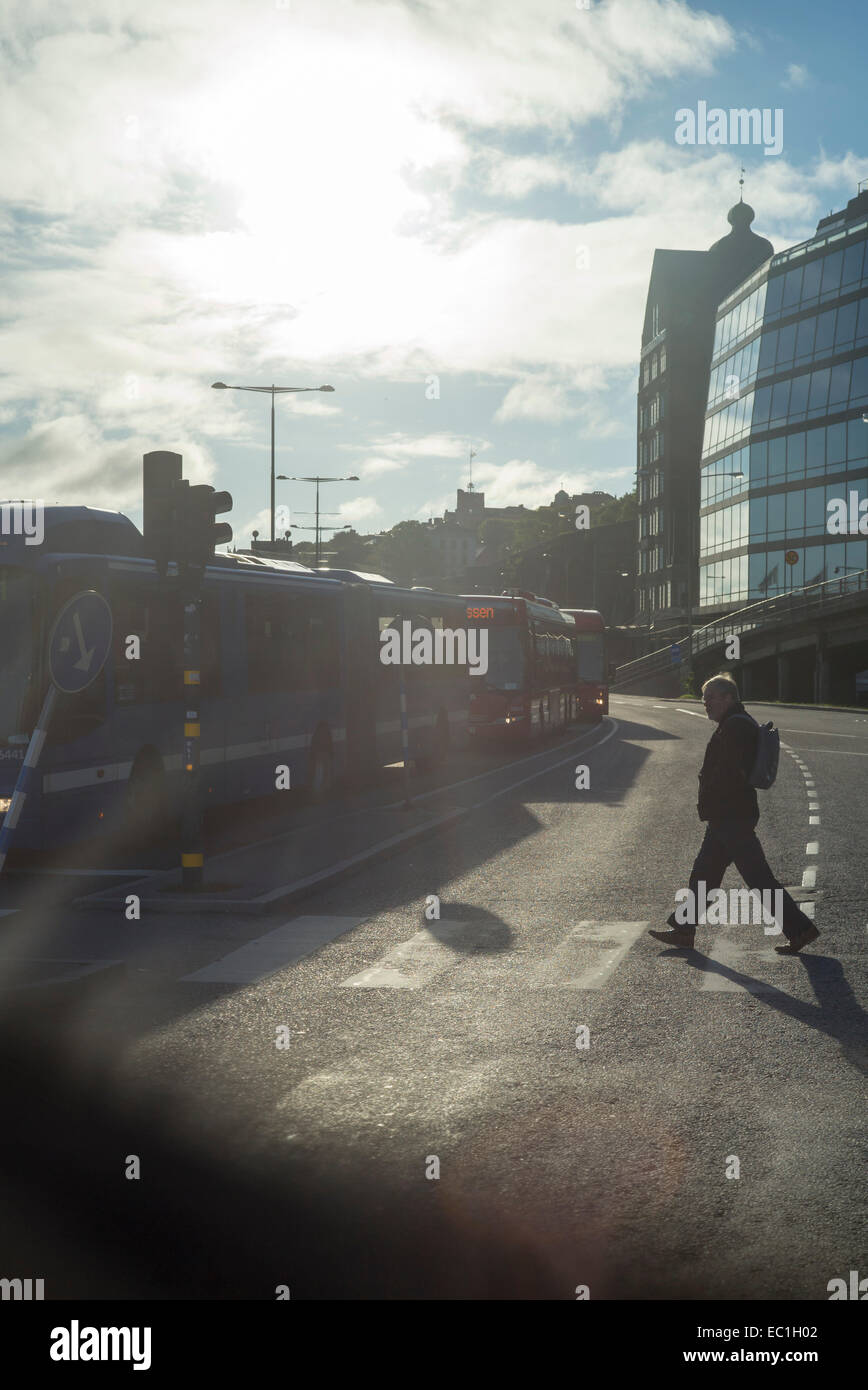 pedestrian on crosswalk by bus Stock Photo - Alamy