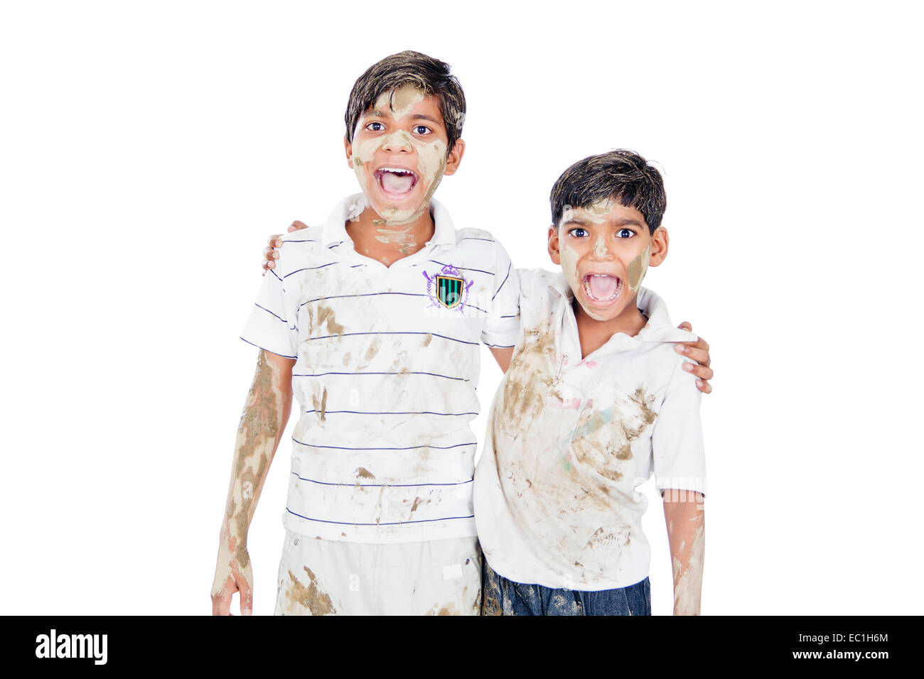 2 indans kids boys Friends Shouting Arm around standing Dirty Clothes ...
