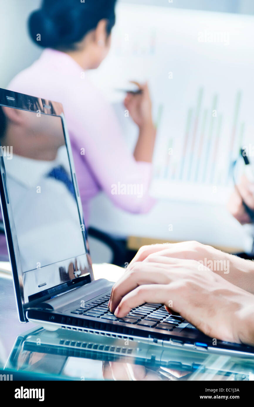 Business office worker sits hi-res stock photography and images - Alamy