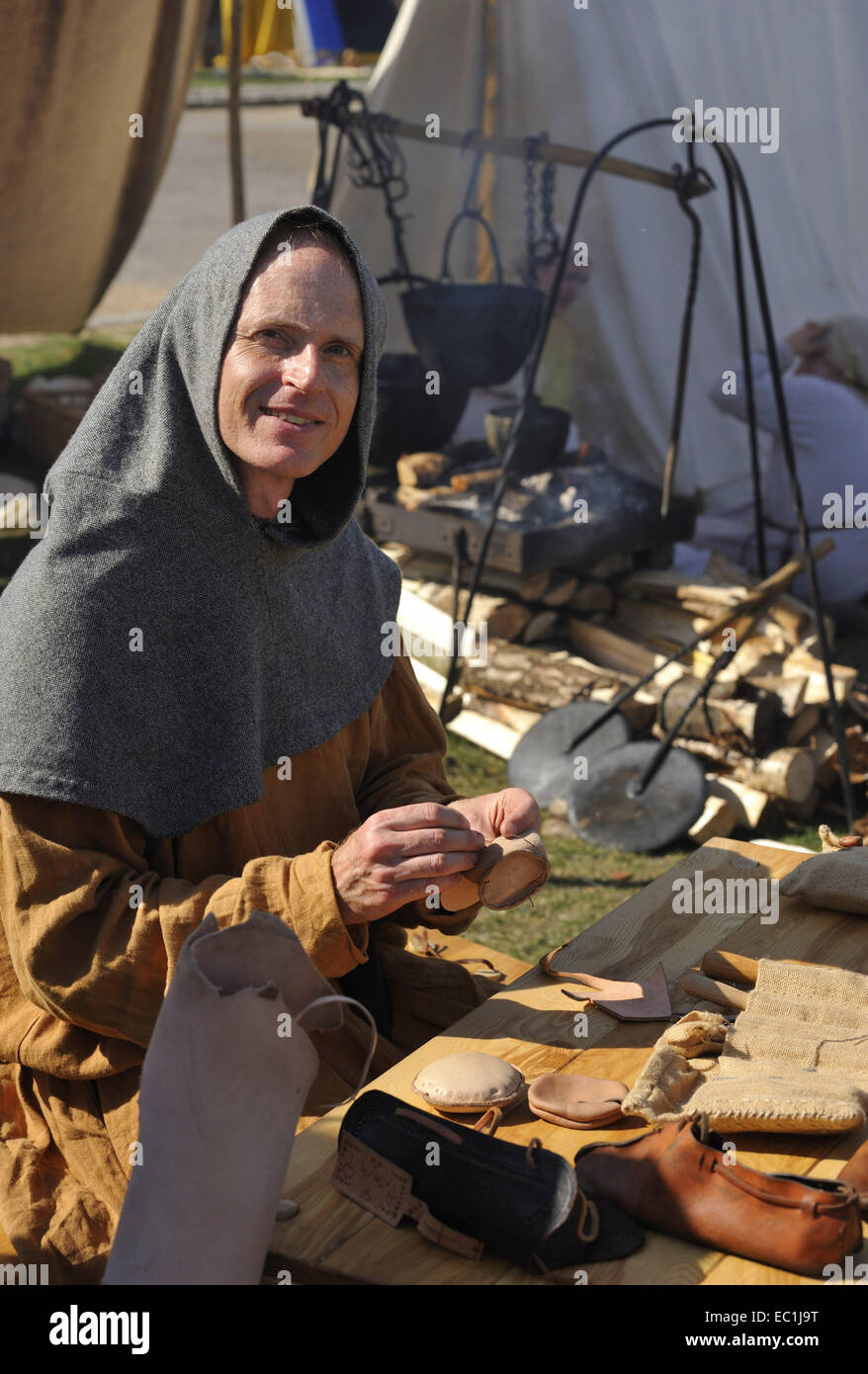 Mediaeval shoe making. Reconstruction (outside Rochester Castle, Kent ...