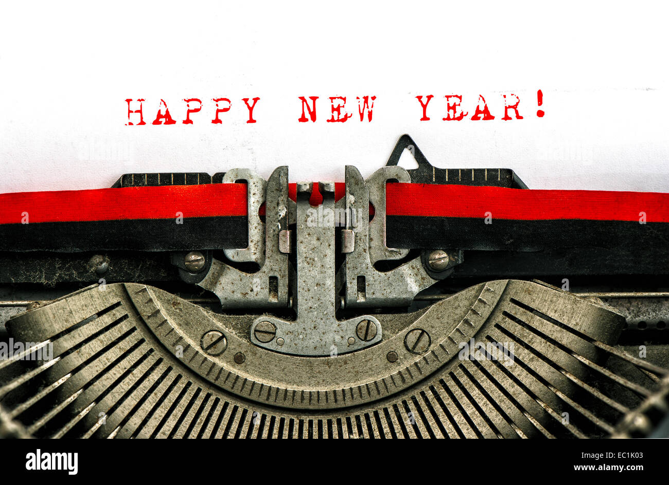Old typewriter with sample text HAPPY NEW YEAR! Red words on white ...