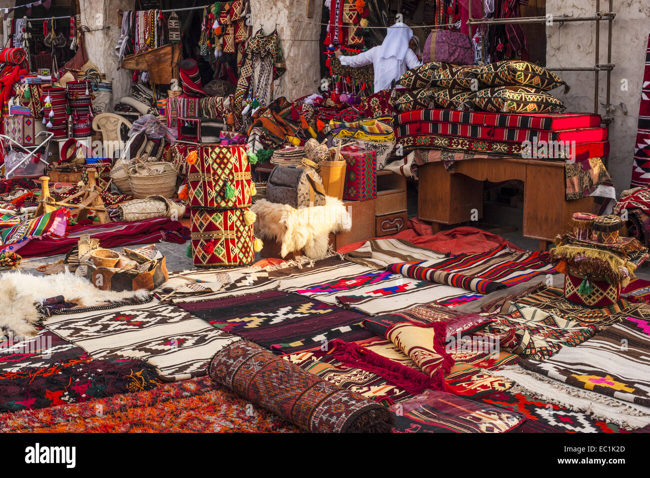 Carpets, rugs, sheepskins displayed in Souk / Souq. Souq Waqif. Local ...