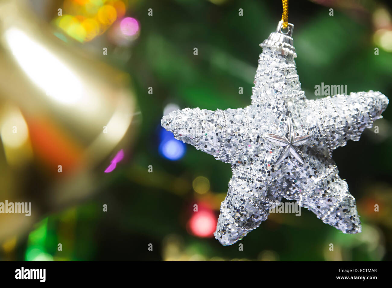Gold star christmas tree hi-res stock photography and images - Alamy