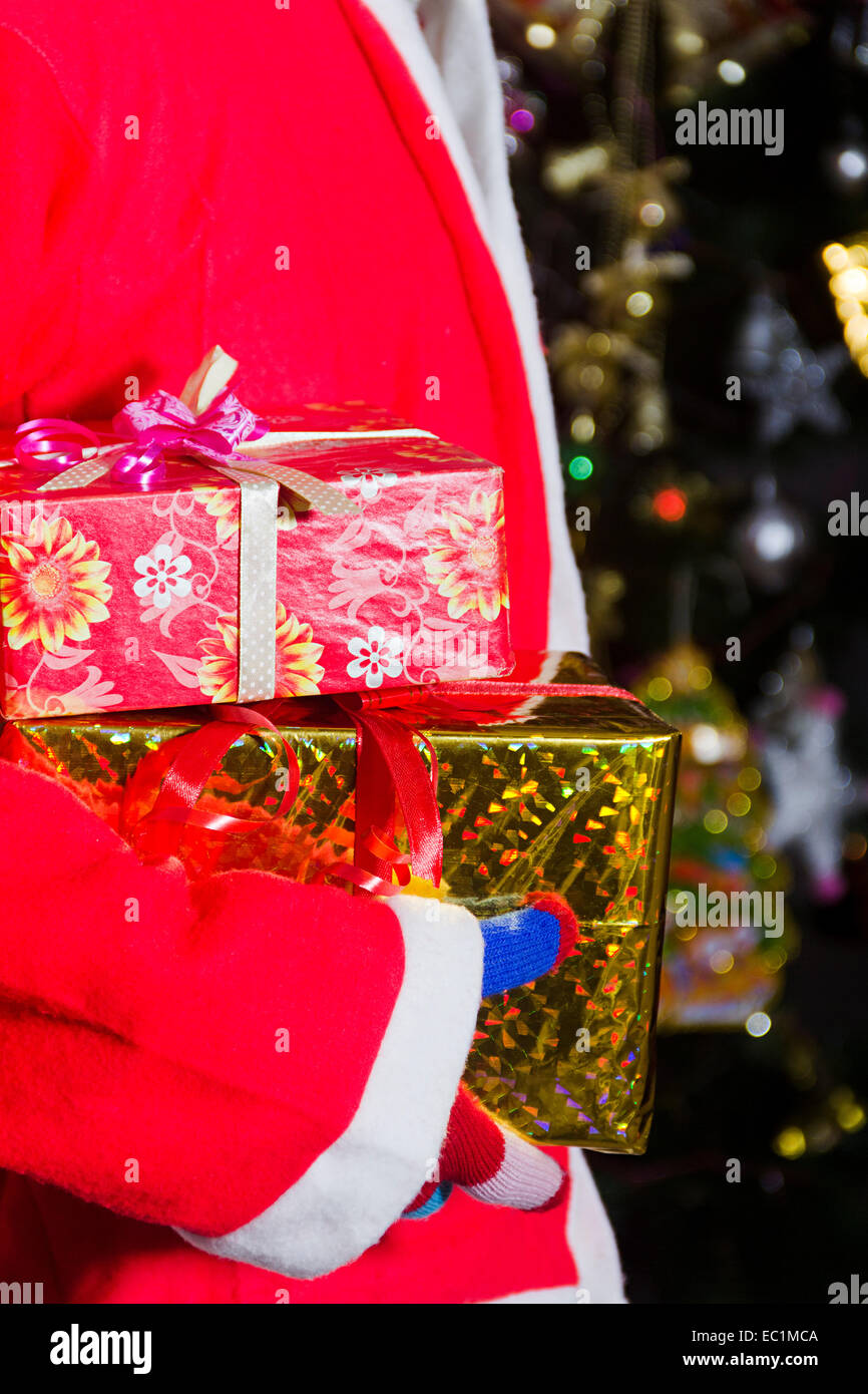 Side view santa claus holding hi-res stock photography and images - Alamy