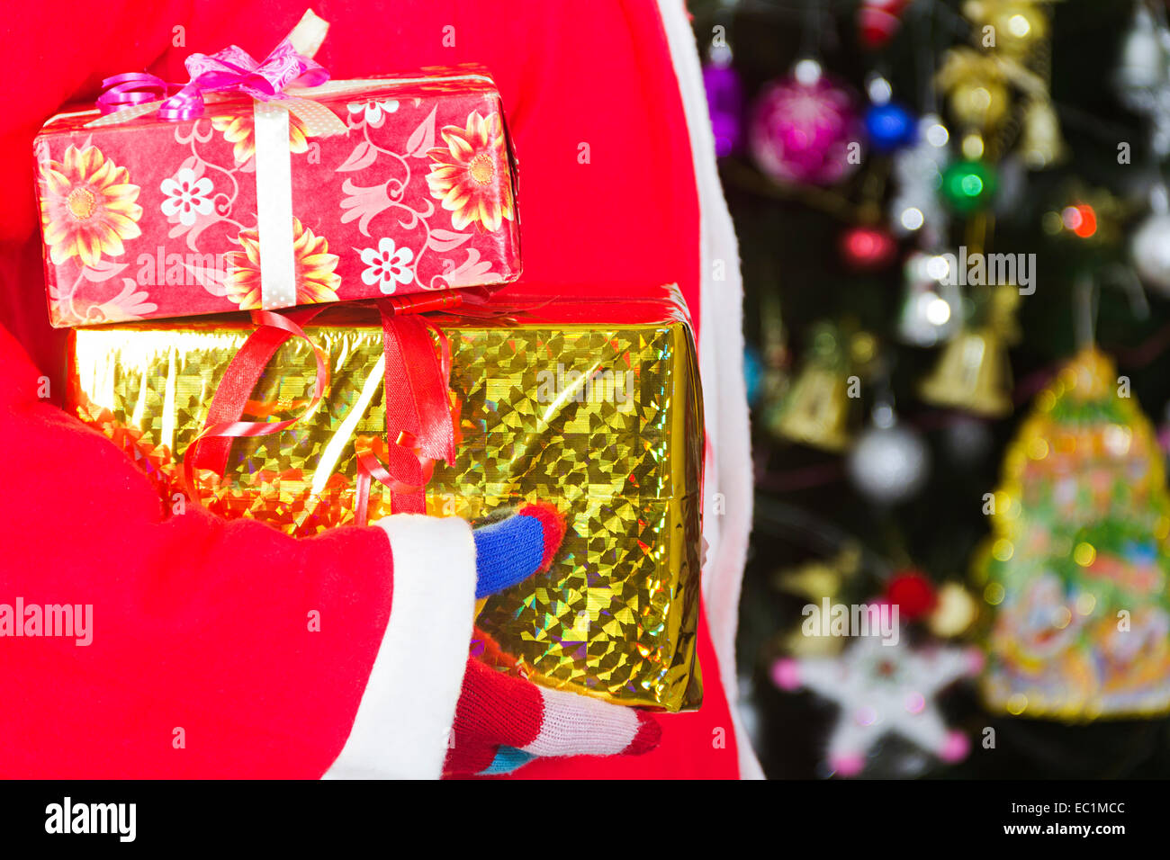 Side view santa claus holding hi-res stock photography and images - Alamy