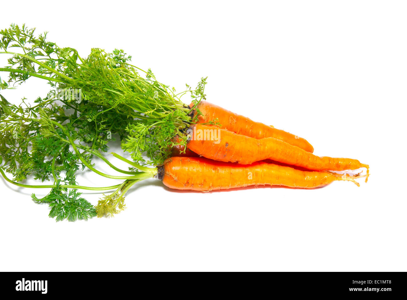Carrots isolated on white Stock Photo - Alamy