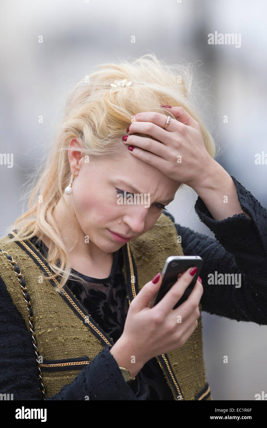 Women experiencing bad mobile phone connection outdoors Stock Photo - Alamy