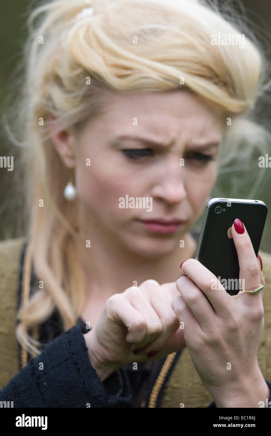 Women experiencing bad mobile phone connection outdoors Stock Photo - Alamy