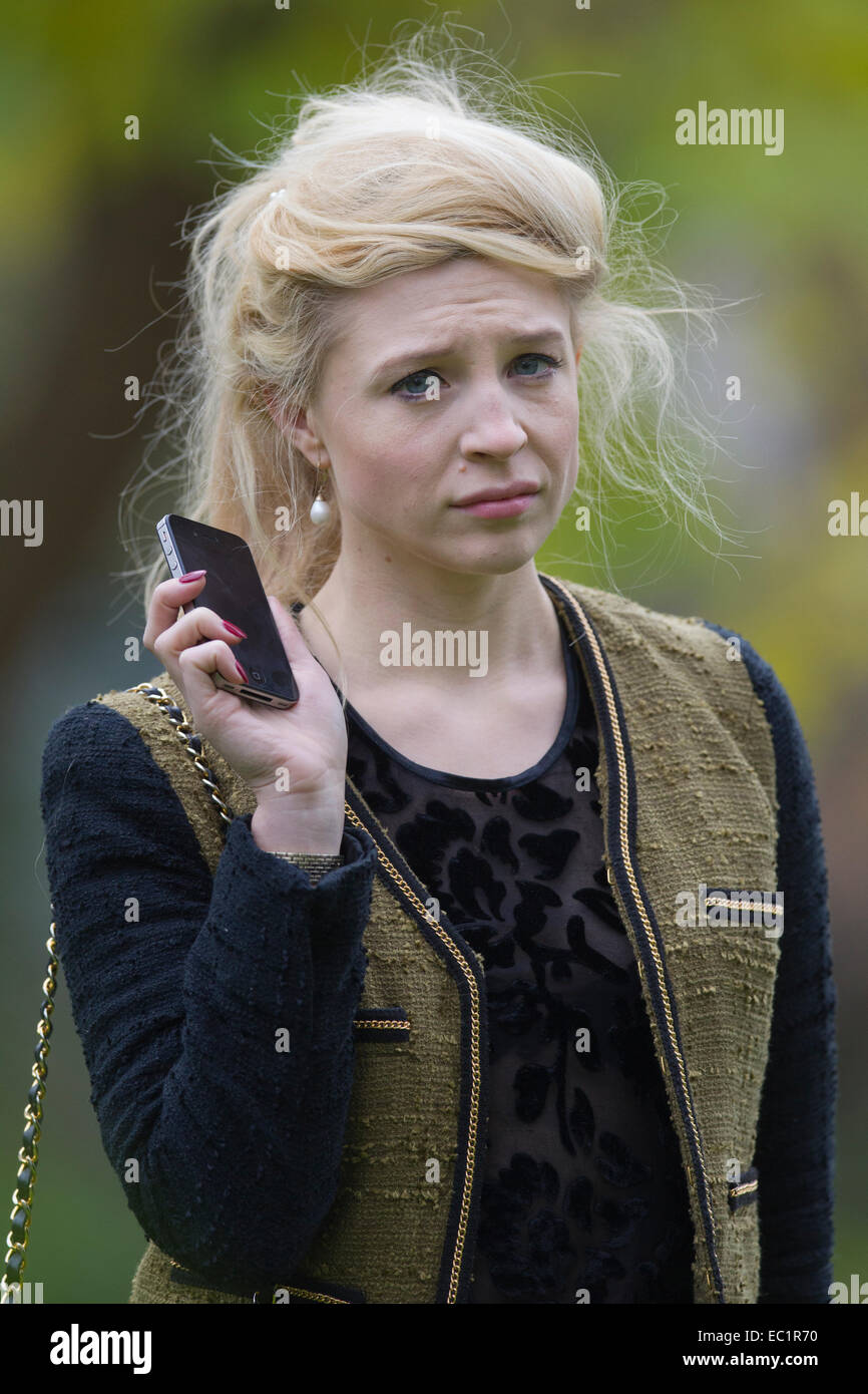 Women experiencing bad mobile phone connection outdoors Stock Photo - Alamy
