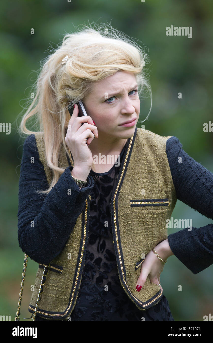 Women experiencing bad mobile phone connection outdoors Stock Photo - Alamy