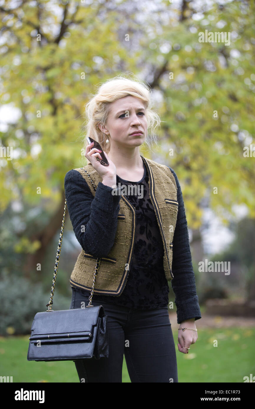 Women experiencing bad mobile phone connection outdoors Stock Photo - Alamy