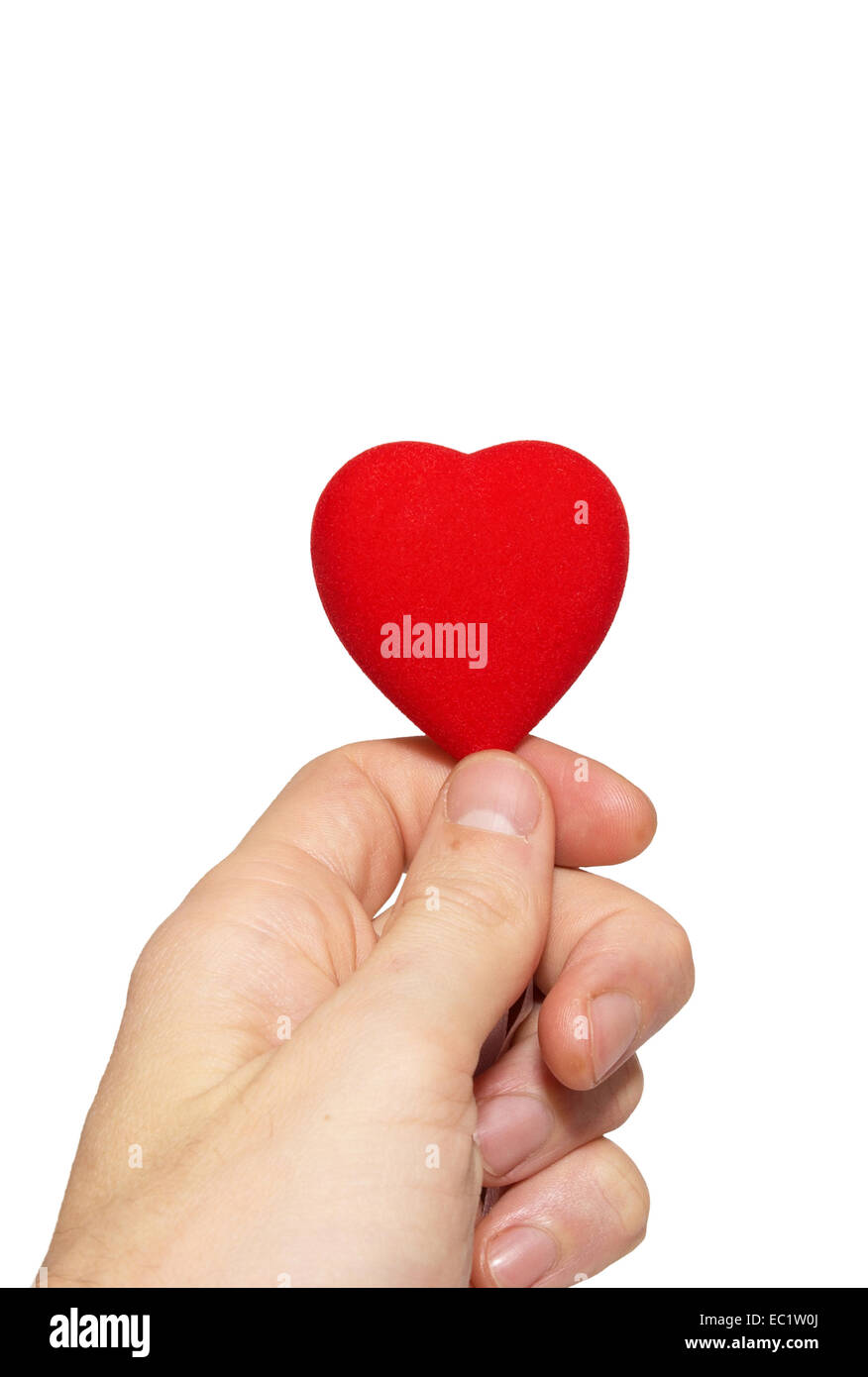 Small valentine heart in a hand Stock Photo - Alamy