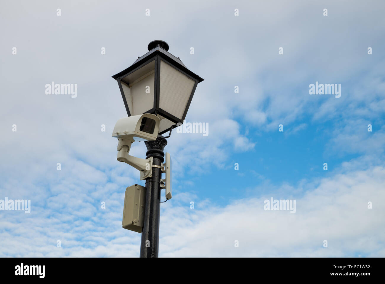 CCTV camera mounted on a classic street lamp Stock Photo - Alamy