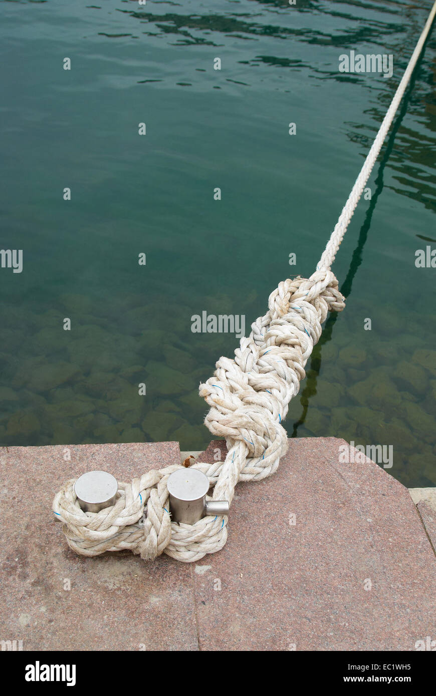 Mooring and knight with rope Stock Photo - Alamy