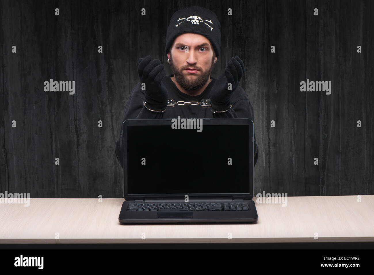 Handlocked computer hakcer under arrest. Computer hacker concept Stock ...