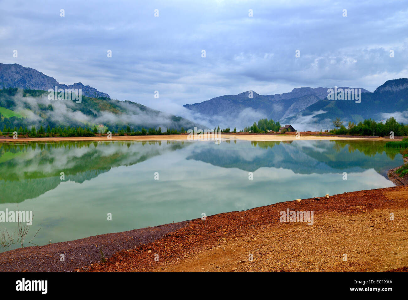 Sedimentation pool, sludge pond in the mining area of the open pit mine ...