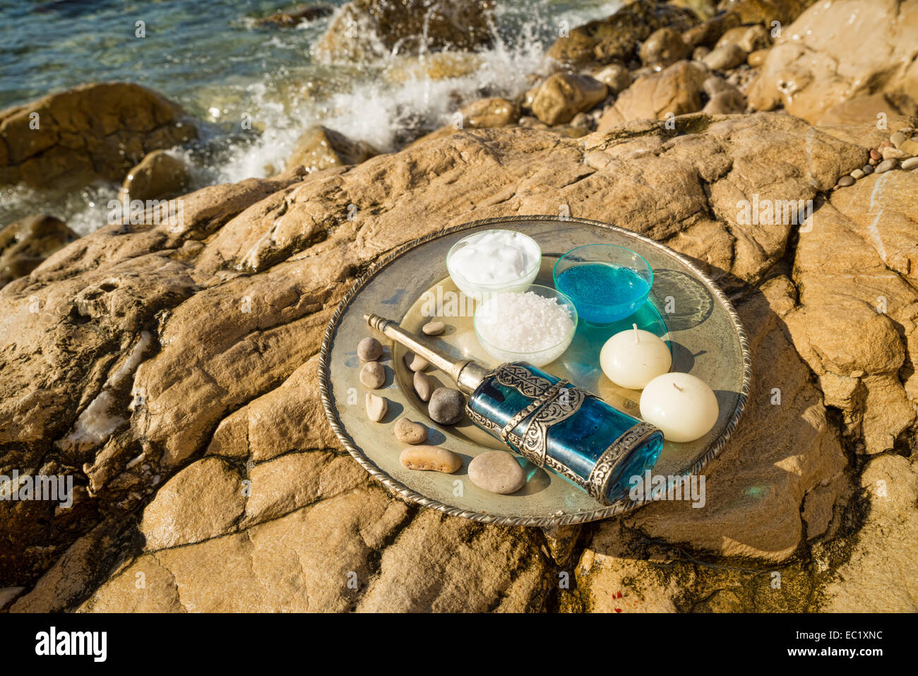 A tray with natural cosmetics on a seaside rock Stock Photo - Alamy