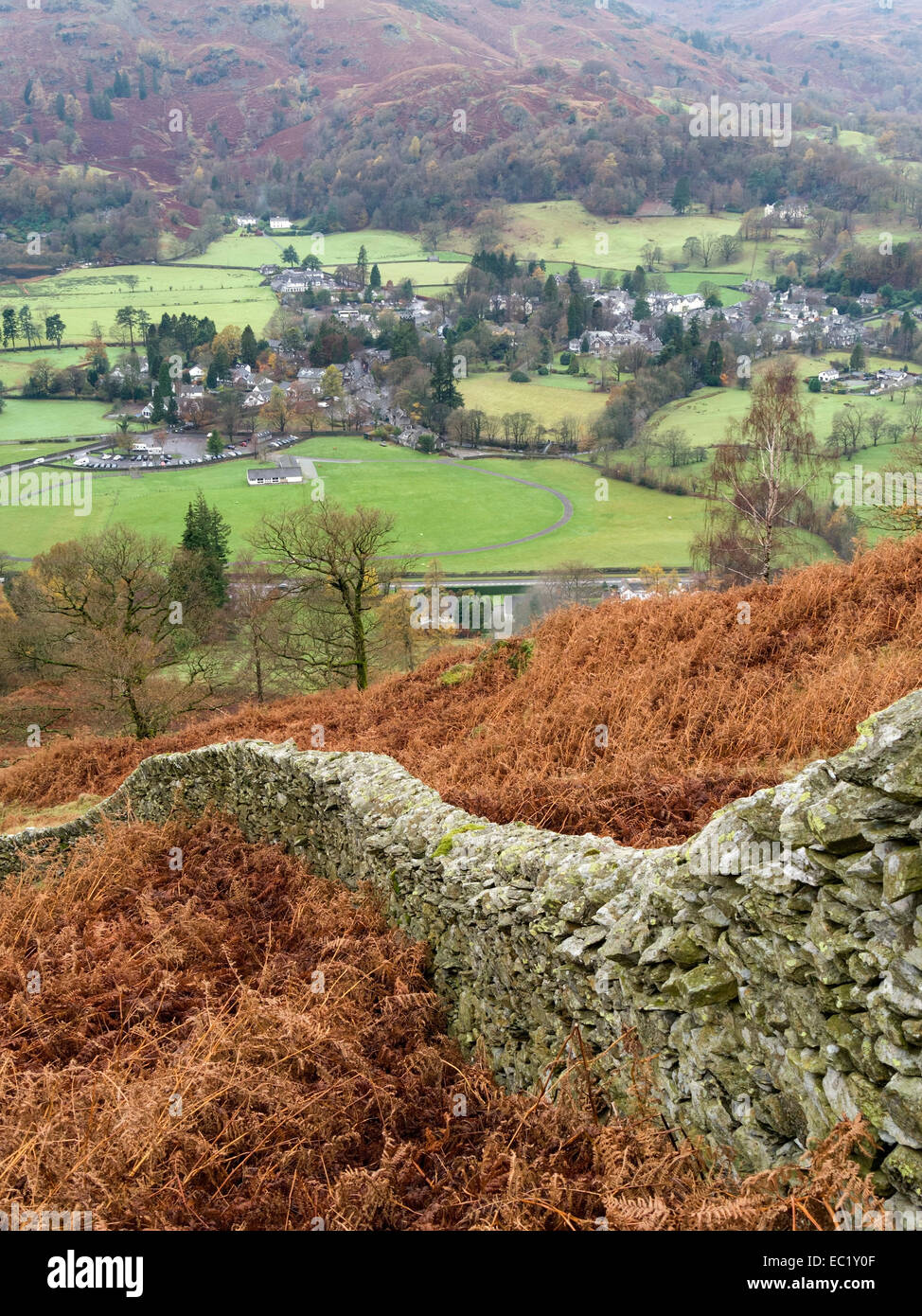 Aerial view of Grasmere Village from Grey Crag with dry stone wall in ...